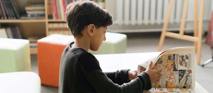 Turning the pages of a Book - International Montessori Job